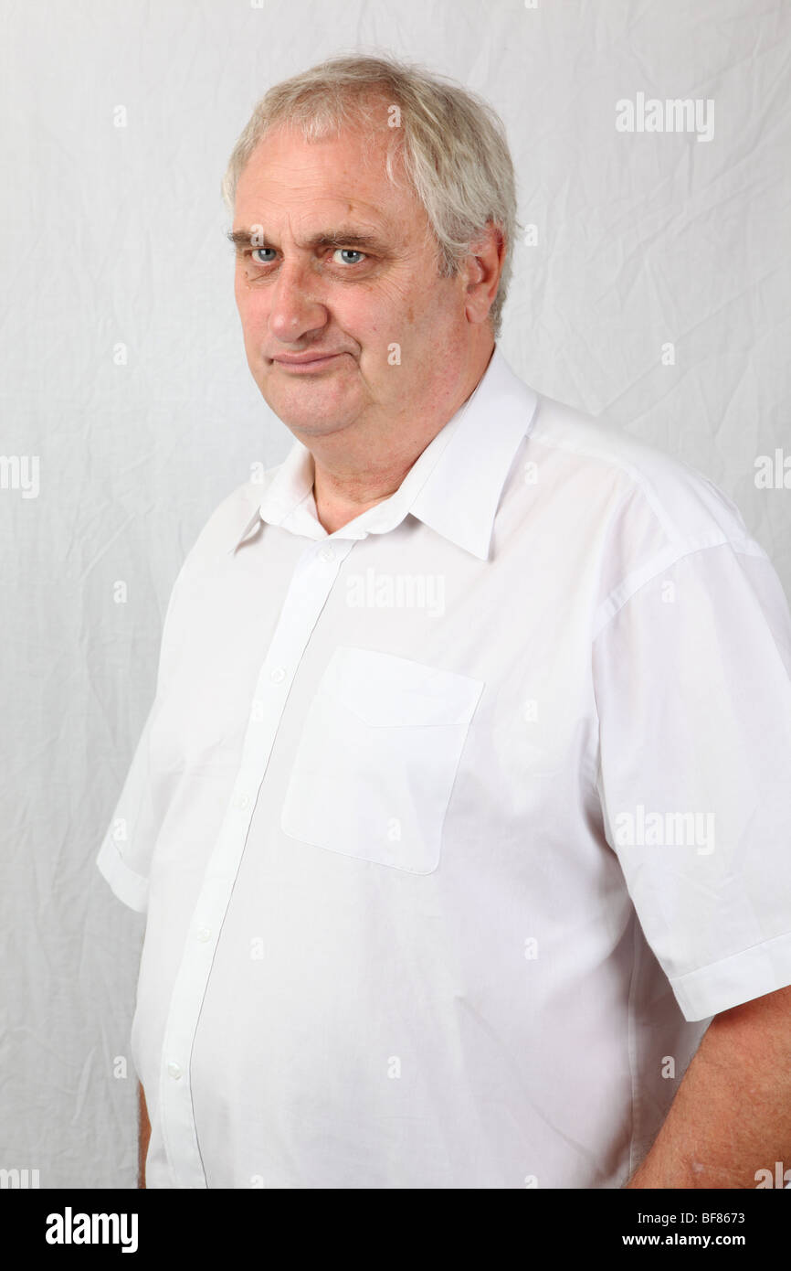 Bored fed up frustrated grey 60s late middle aged man with ...