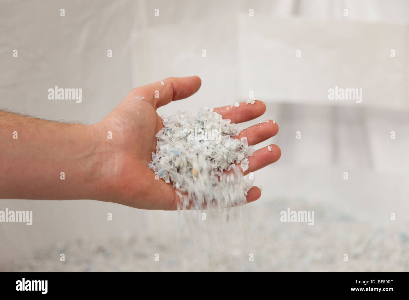 recycled plastic in hand Stock Photo - Alamy