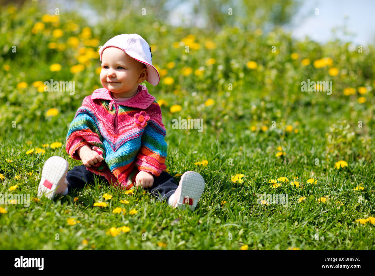 Adorable baby girl outdoors at sunny summer day Stock Photo - Alamy
