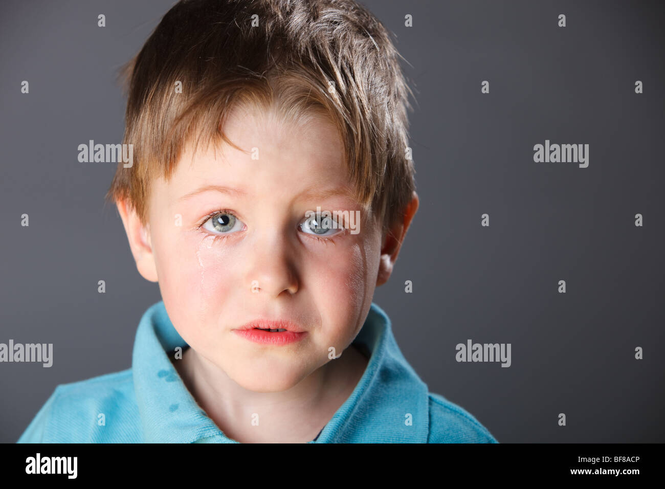 Tearful boy hi-res stock photography and images - Alamy
