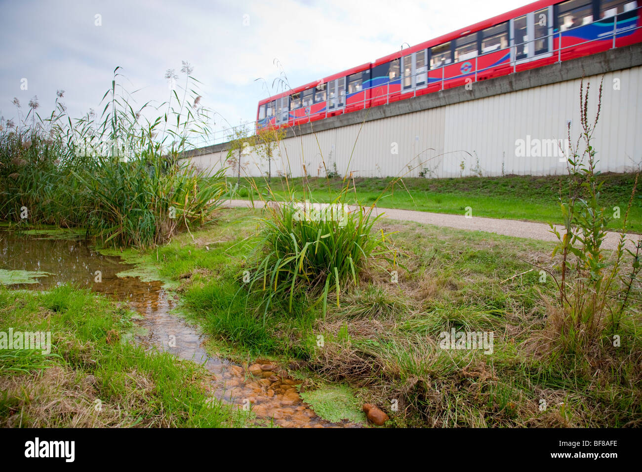 Docklands light railway DLR train by Bow Creek Ecology Park, a small ...