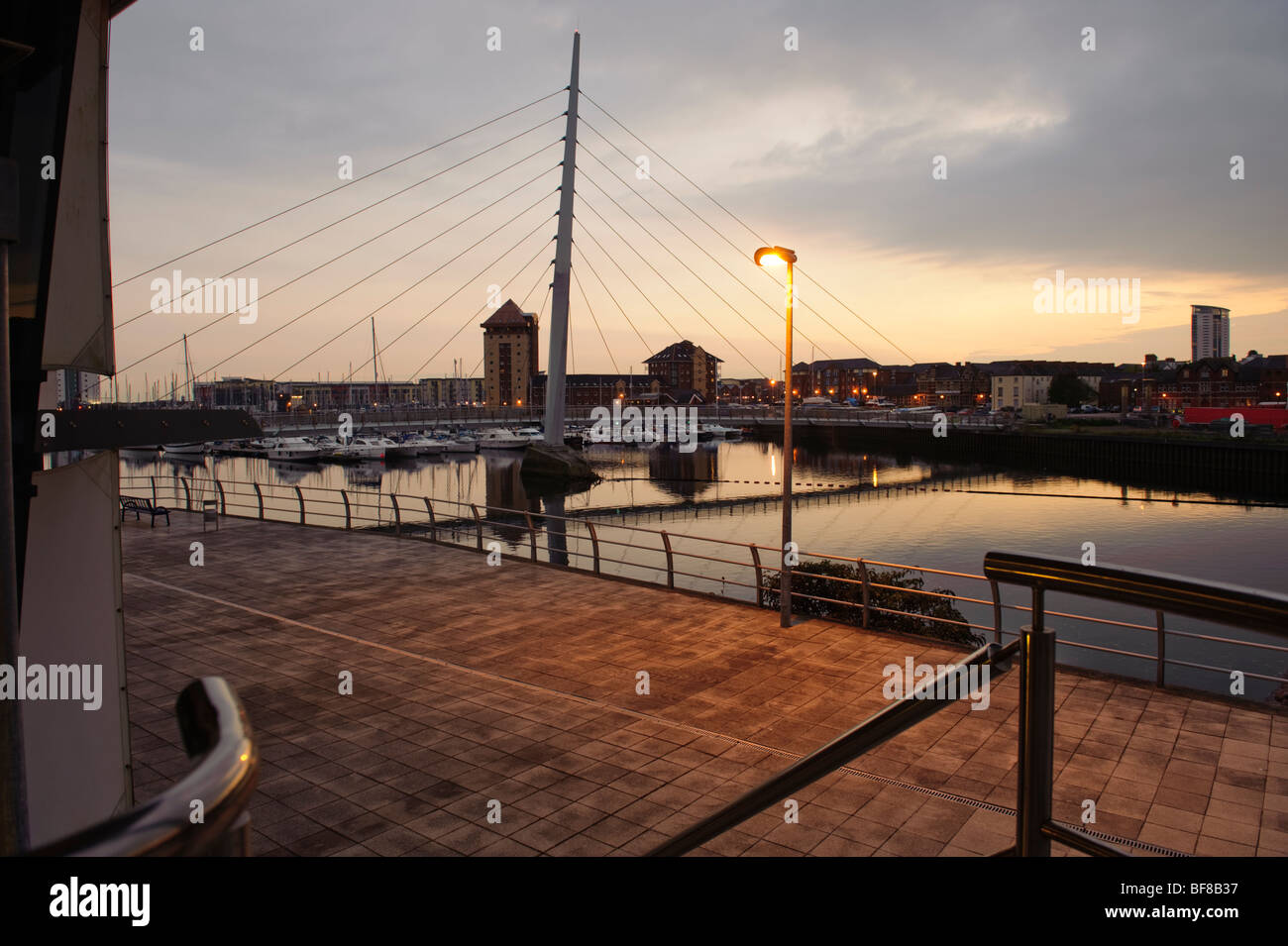 The Sail Bridge footbridge in Swansea SA1 docklands redevelopment zone ...