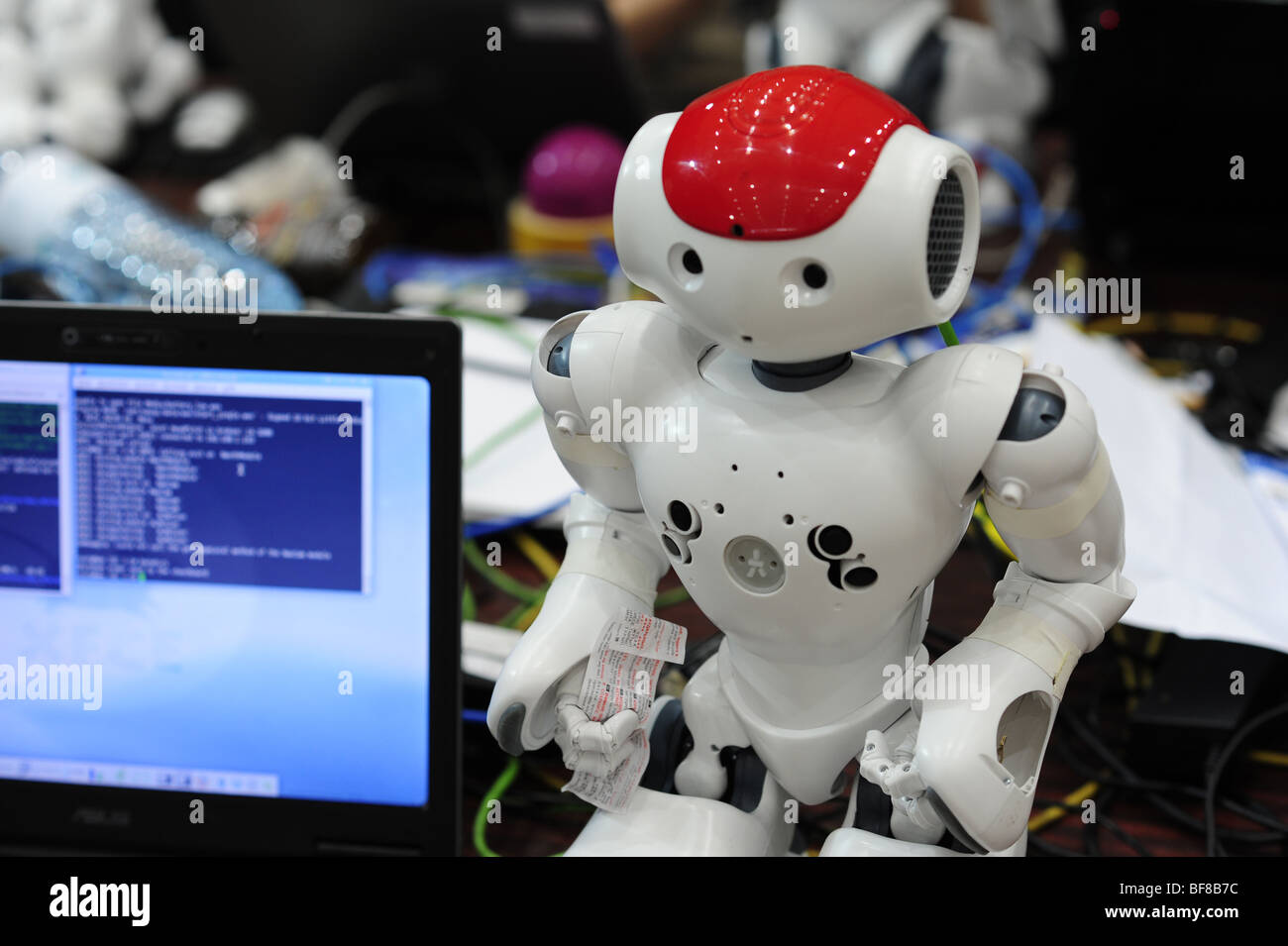 Humanoid programming robot hi-res stock photography and images - Alamy