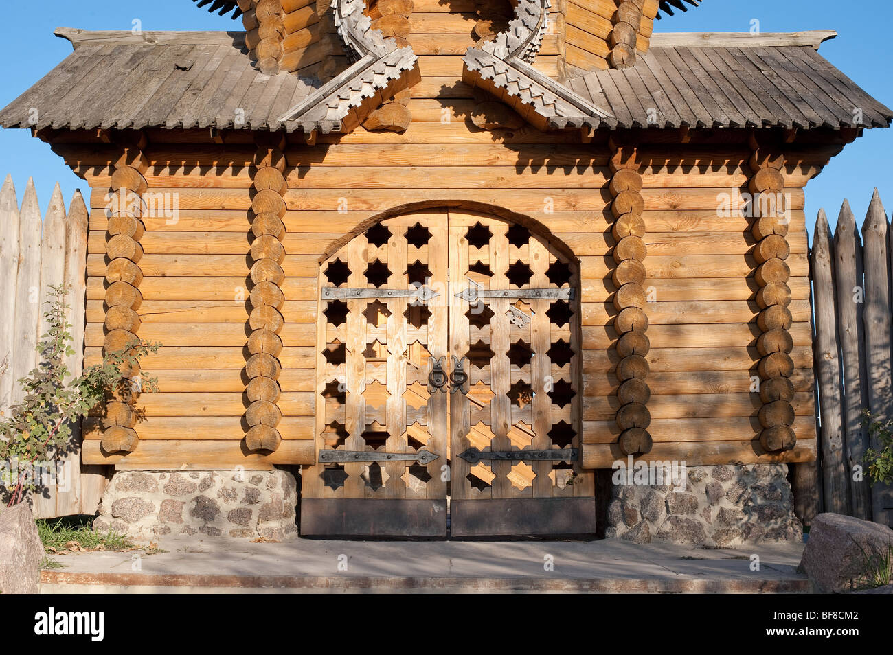Wooden gate. A gate in ancient style Stock Photo - Alamy