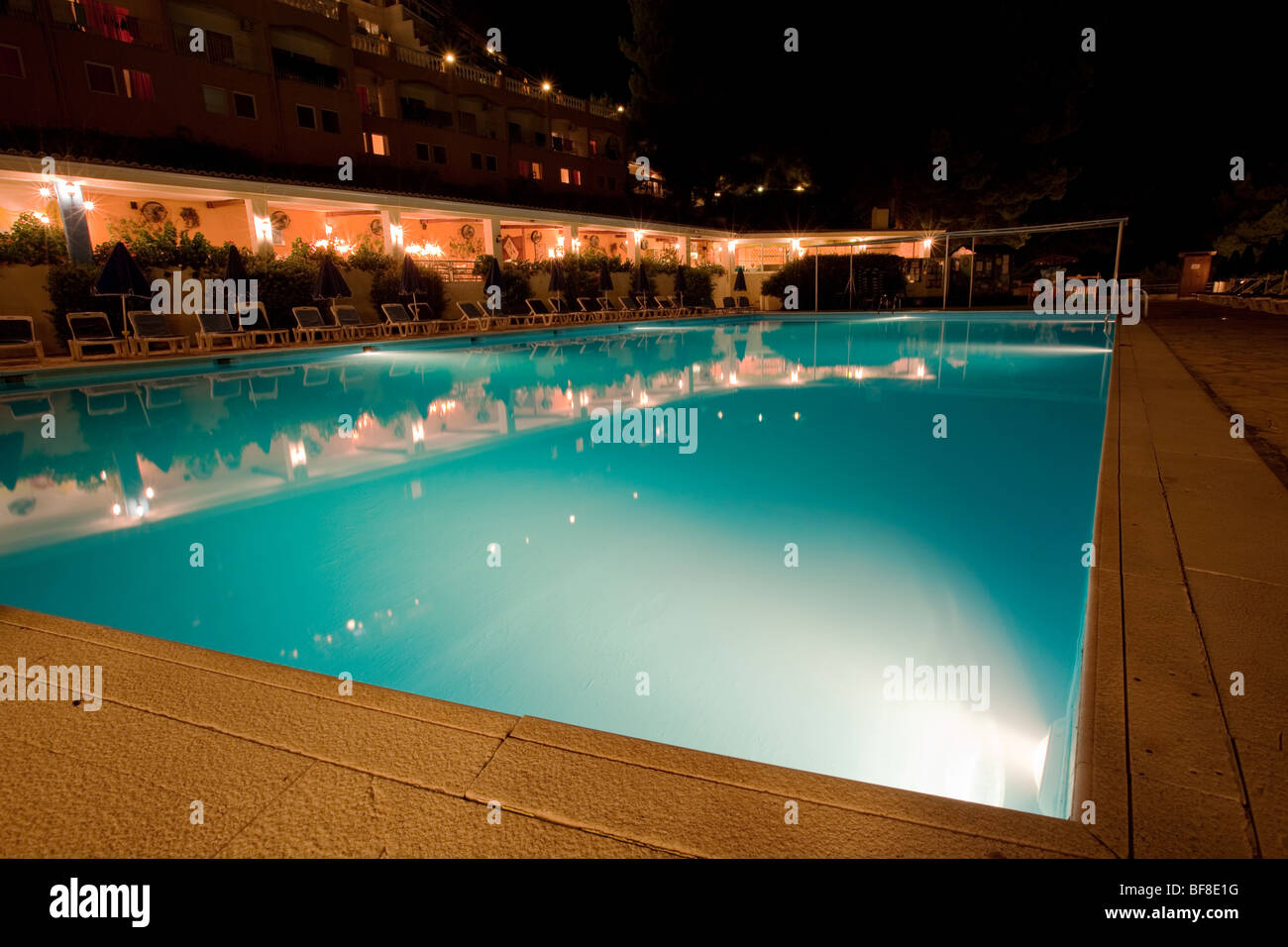 Swimming pool night greece hi-res stock photography and images - Alamy
