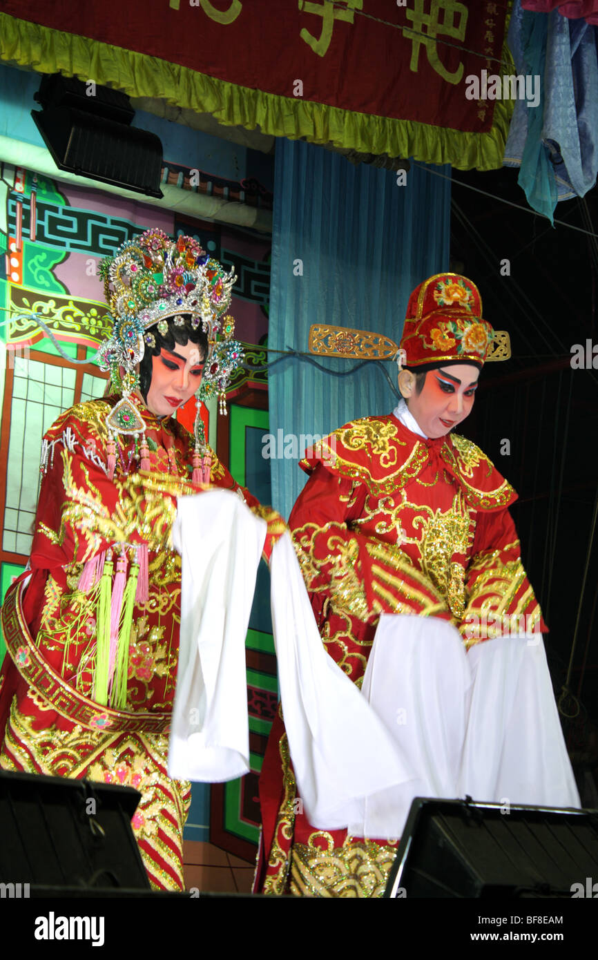 Chinese opera performers showing on stage , Bangkok 's Chinatown ...