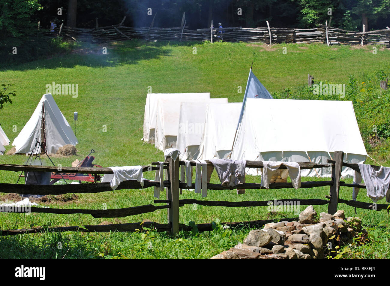 Clothes drying on fence in military tent camp - costumed American ...