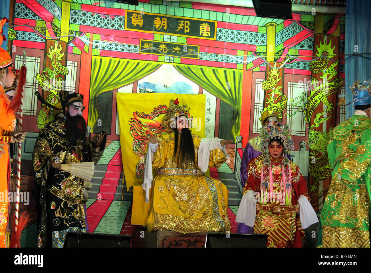 Chinese opera performers showing on stage , Bangkok 's Chinatown ...