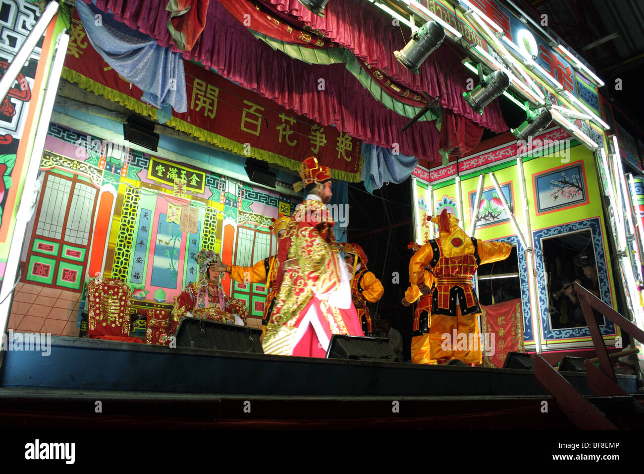 Chinese opera performers showing on stage , Bangkok 's Chinatown ...