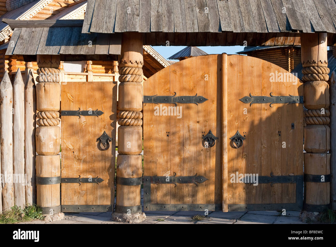 Wooden gate. A gate in ancient style Stock Photo - Alamy