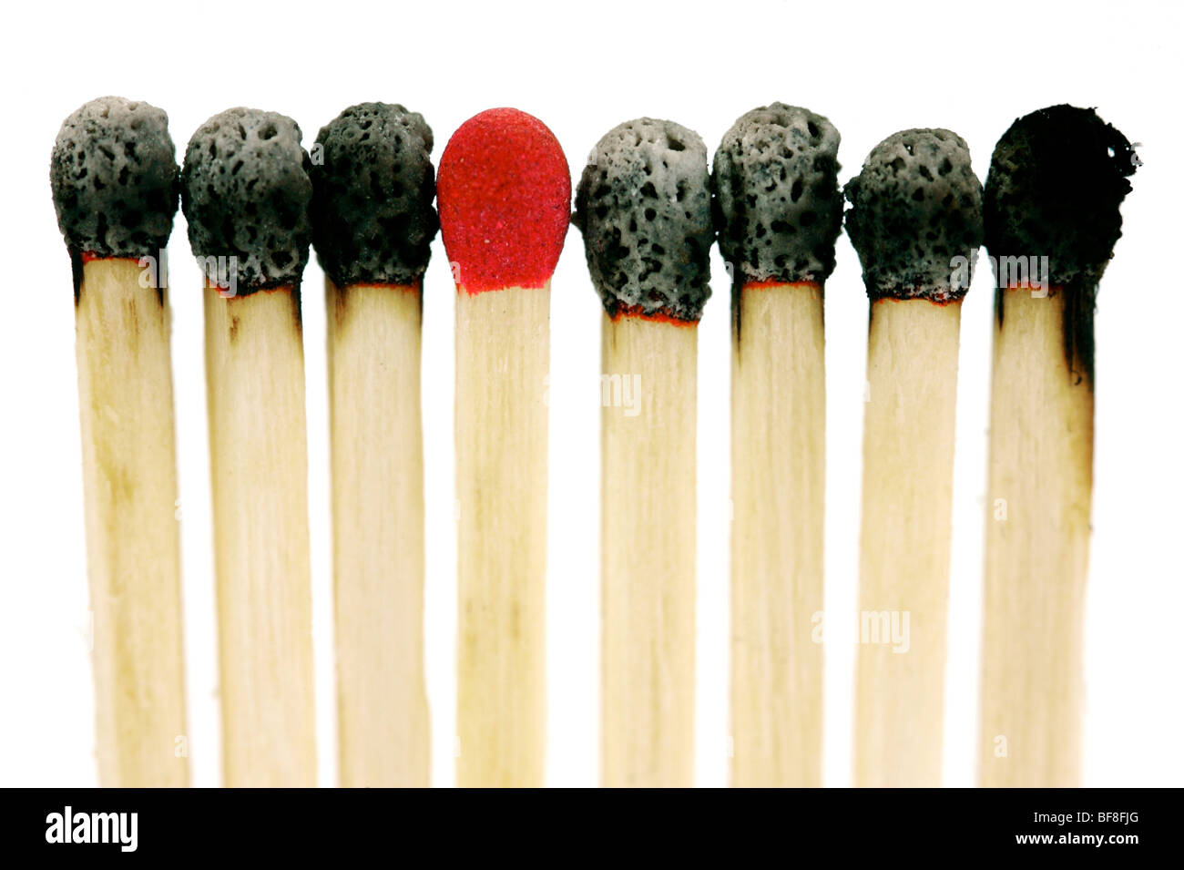 Red head matches isolated against a white background Stock Photo - Alamy