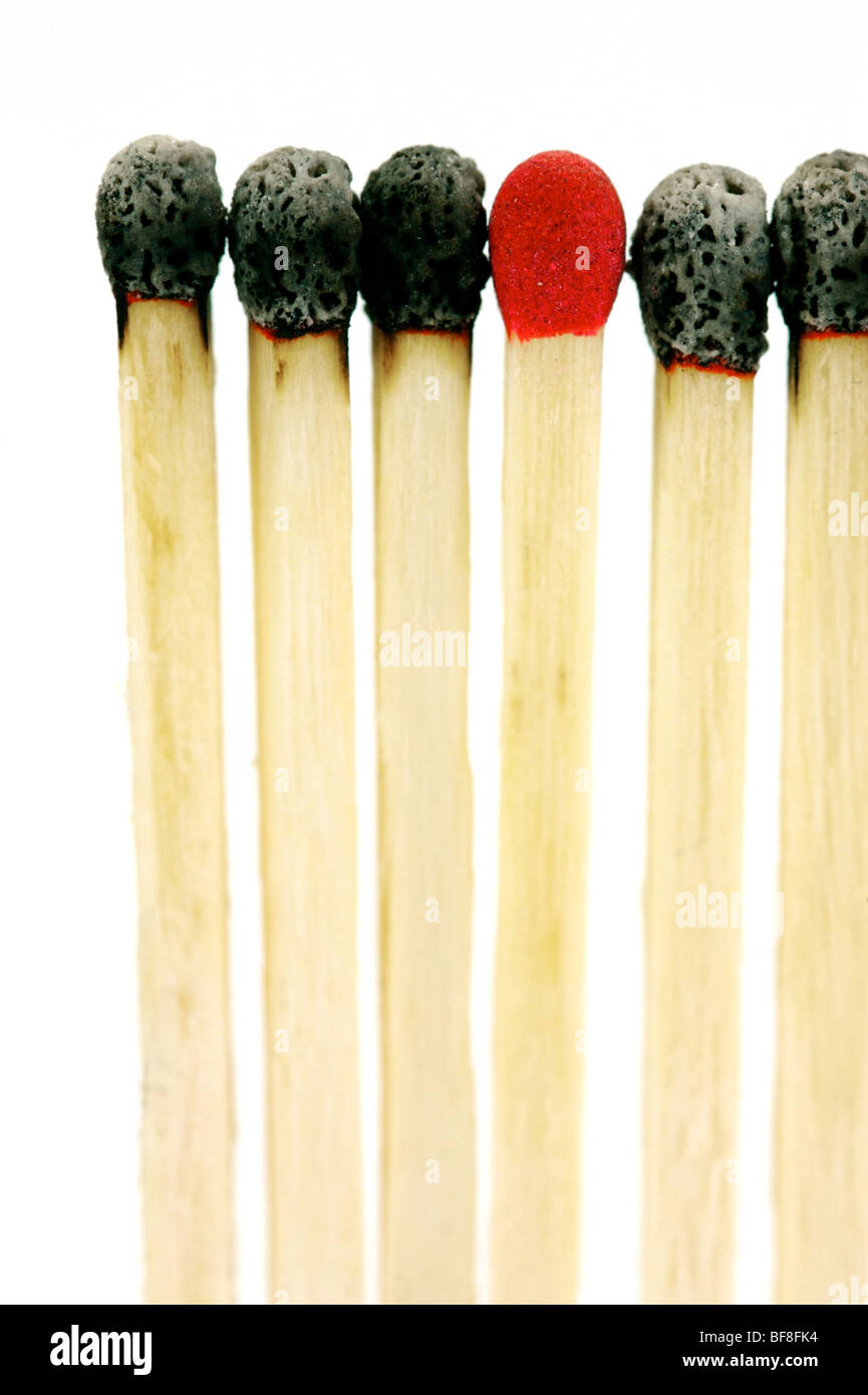 Red head matches isolated against a white background Stock Photo - Alamy