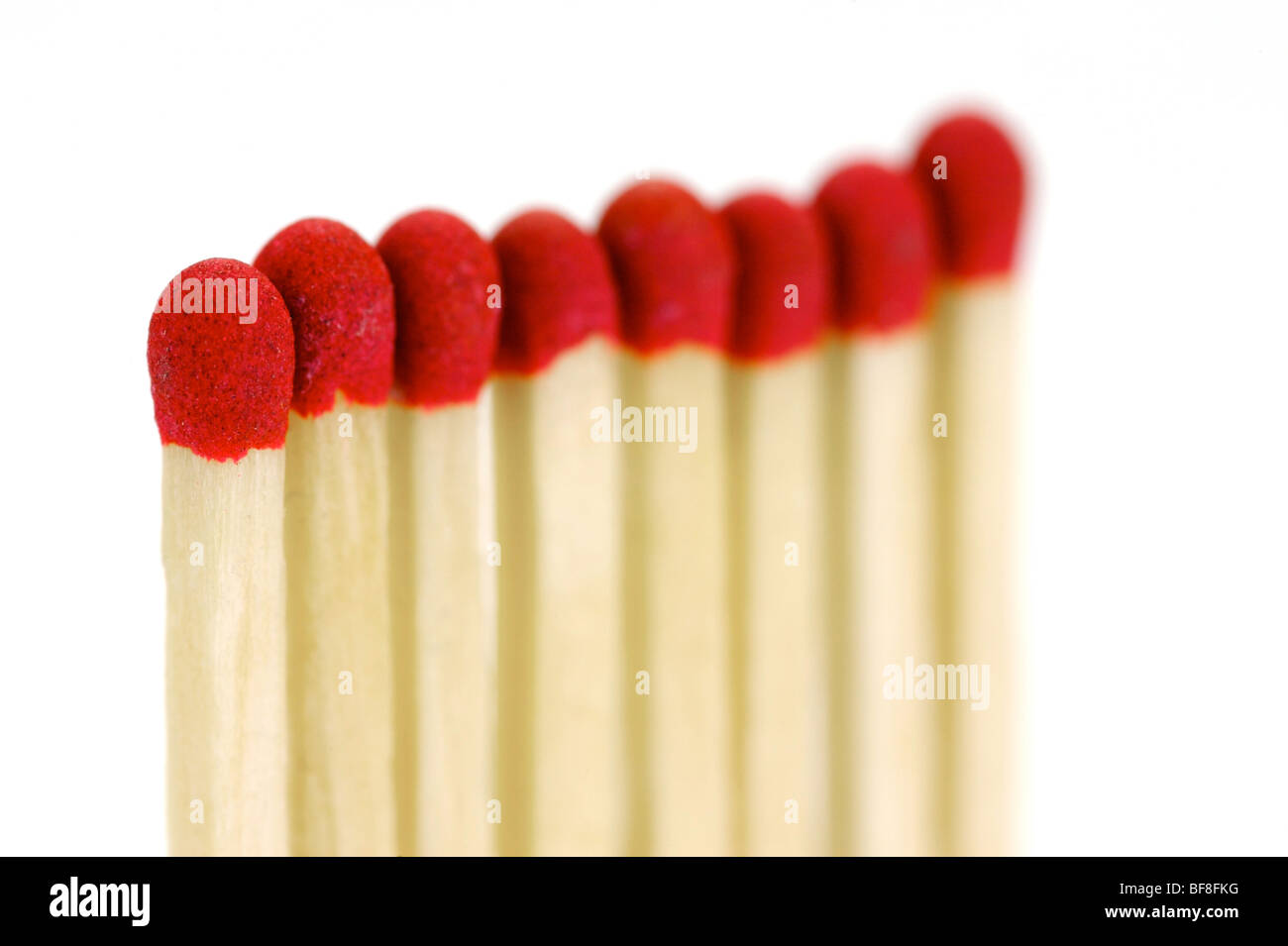 Red head matches isolated against a white background Stock Photo - Alamy