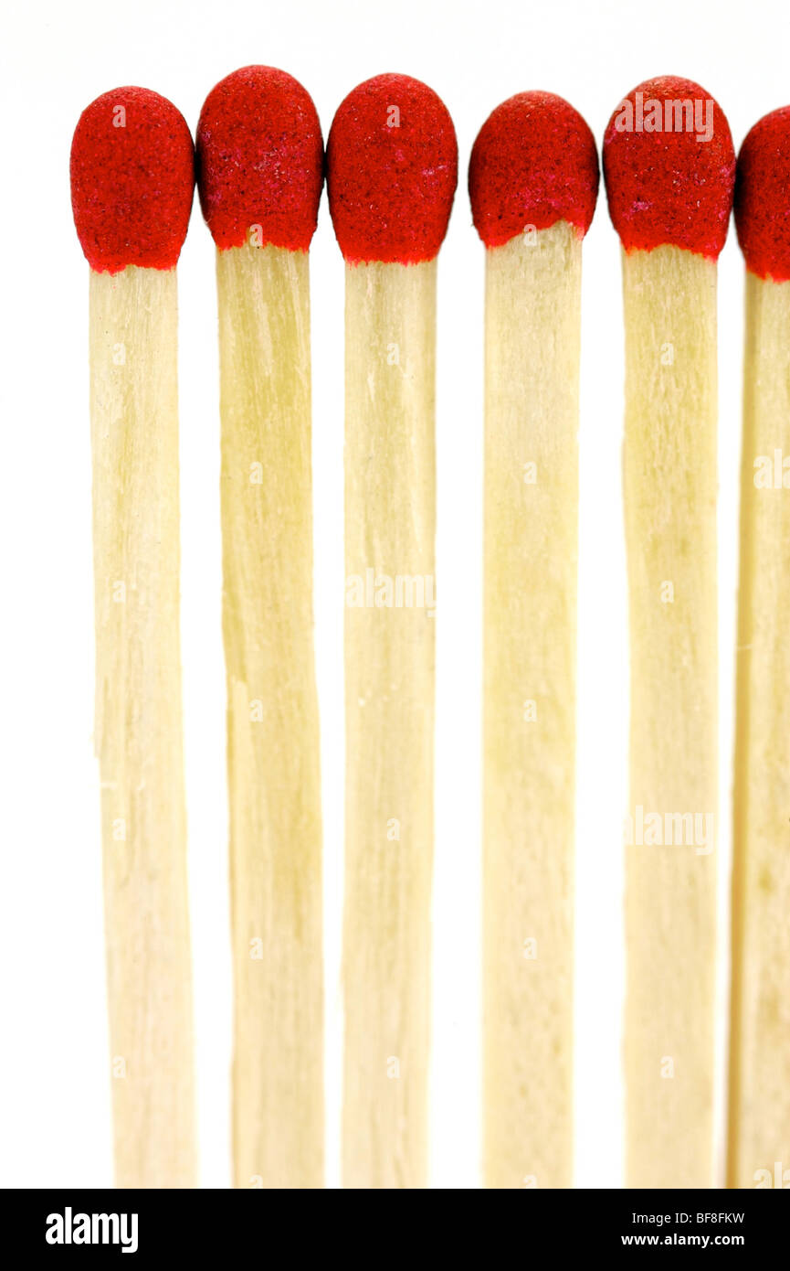 Red head matches isolated against a white background Stock Photo - Alamy