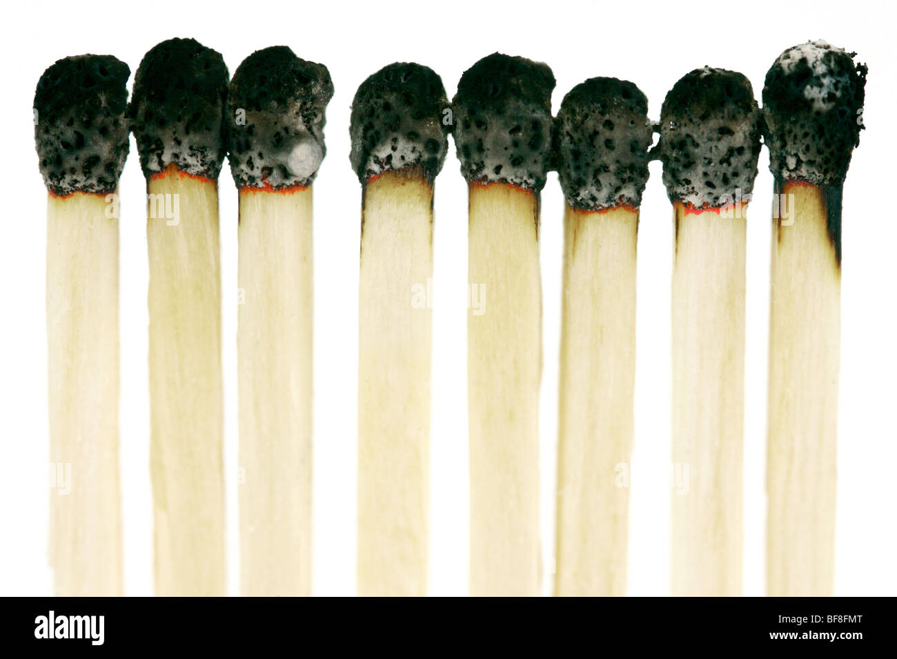 Red head matches isolated against a white background Stock Photo - Alamy