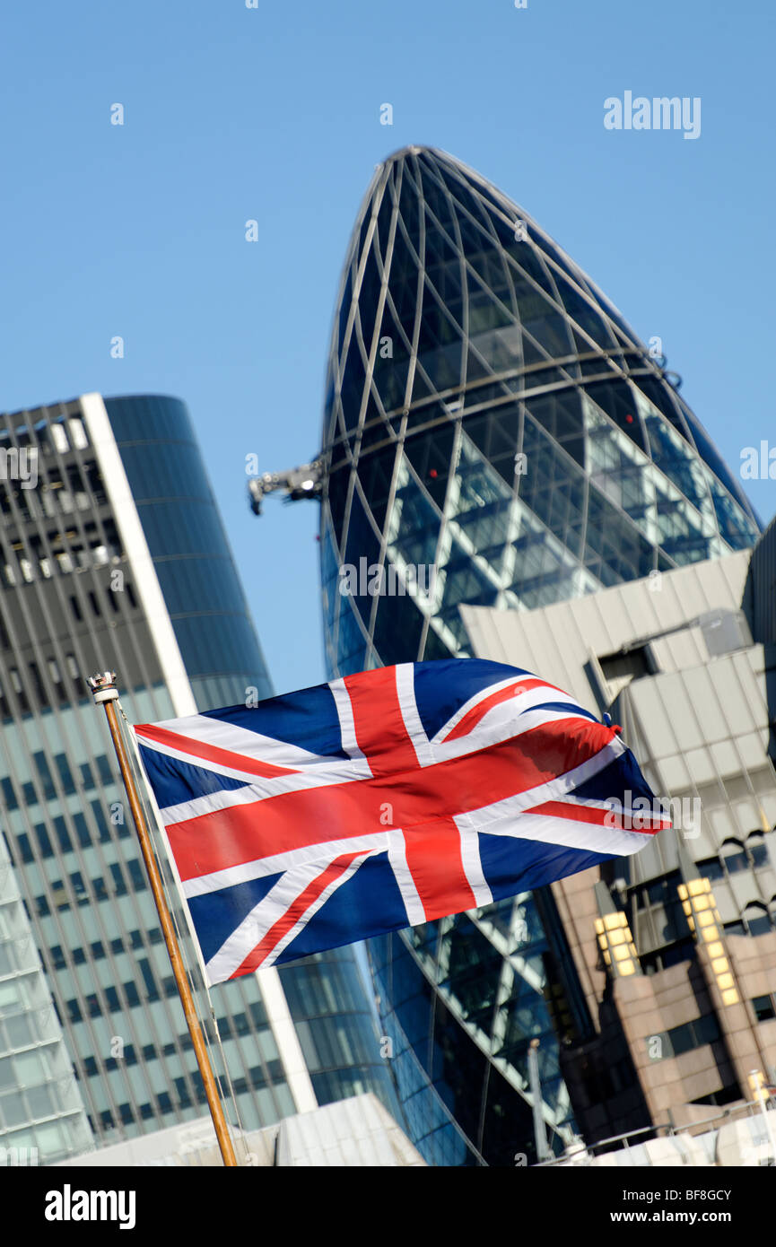 Union Jack flag with the Swiss Re building in the background. City of ...