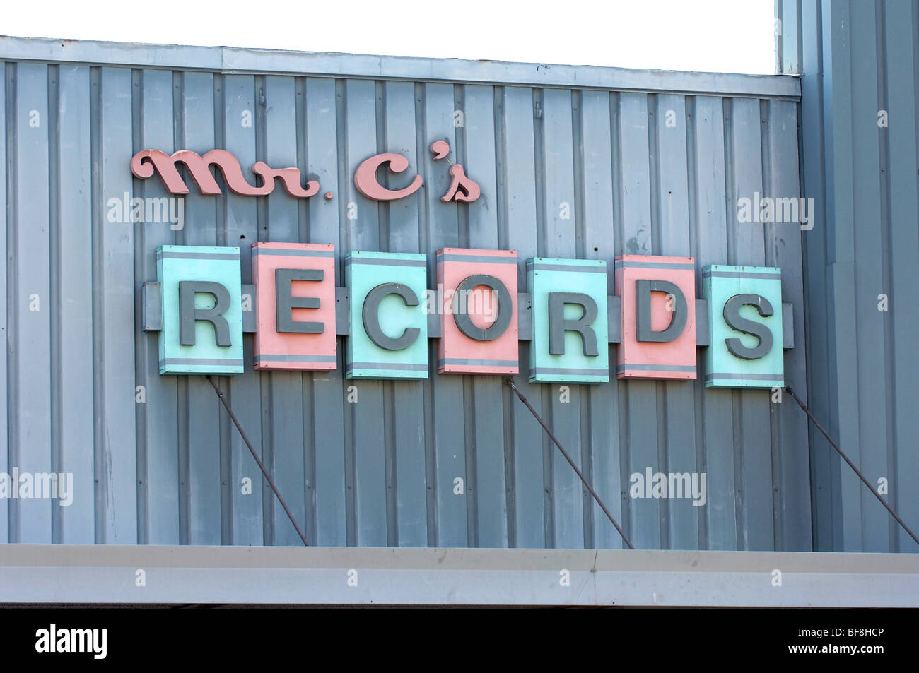 Record Store that still sells vinyl records. Sign shows a 50s style ...