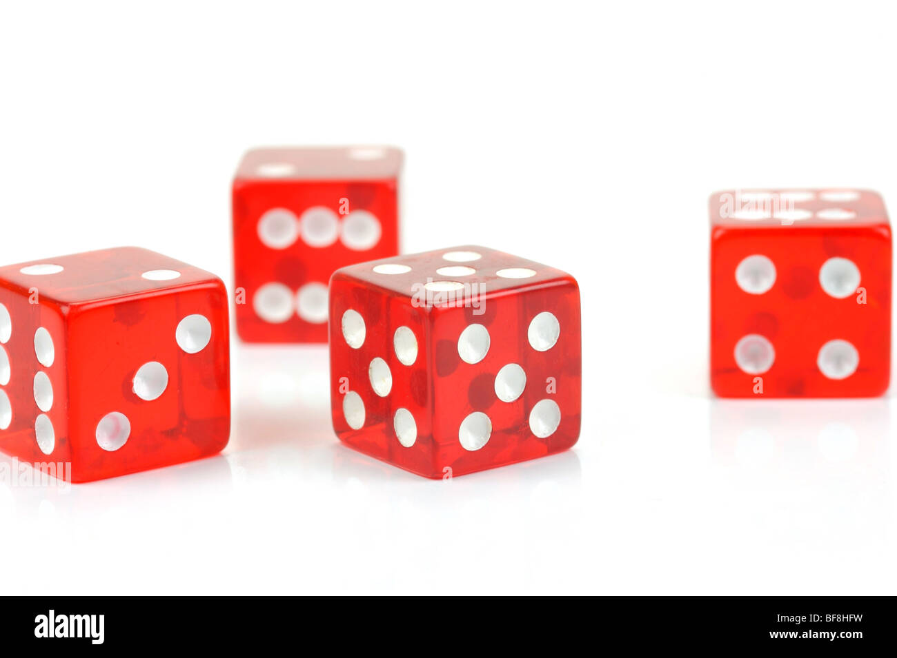 Dice isolated against a white background Stock Photo - Alamy