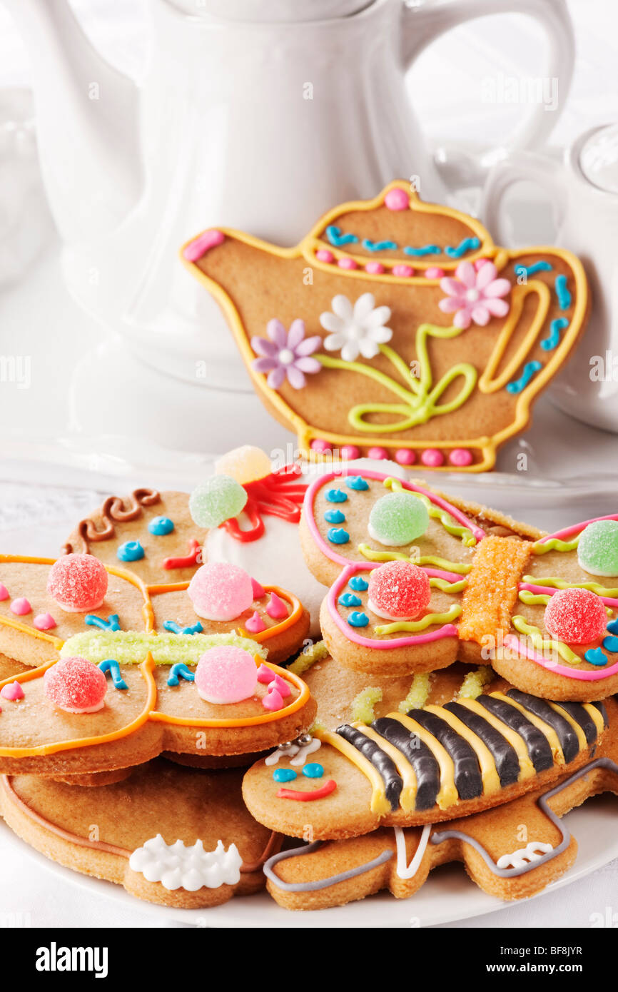A plate of pretty iced biscuits prepared for tea Stock Photo - Alamy
