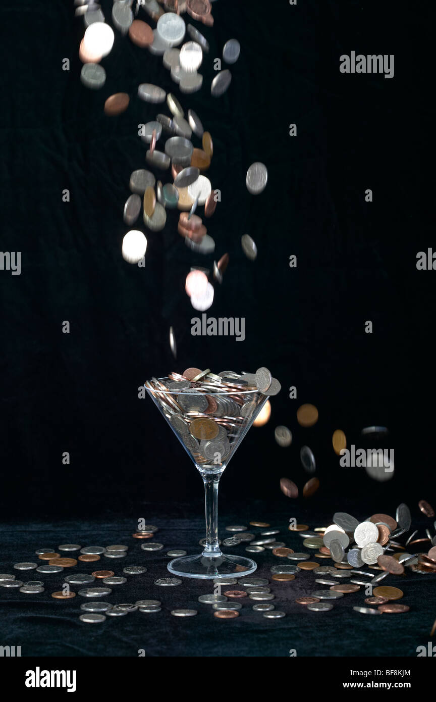 Money falling hi-res stock photography and images - Alamy