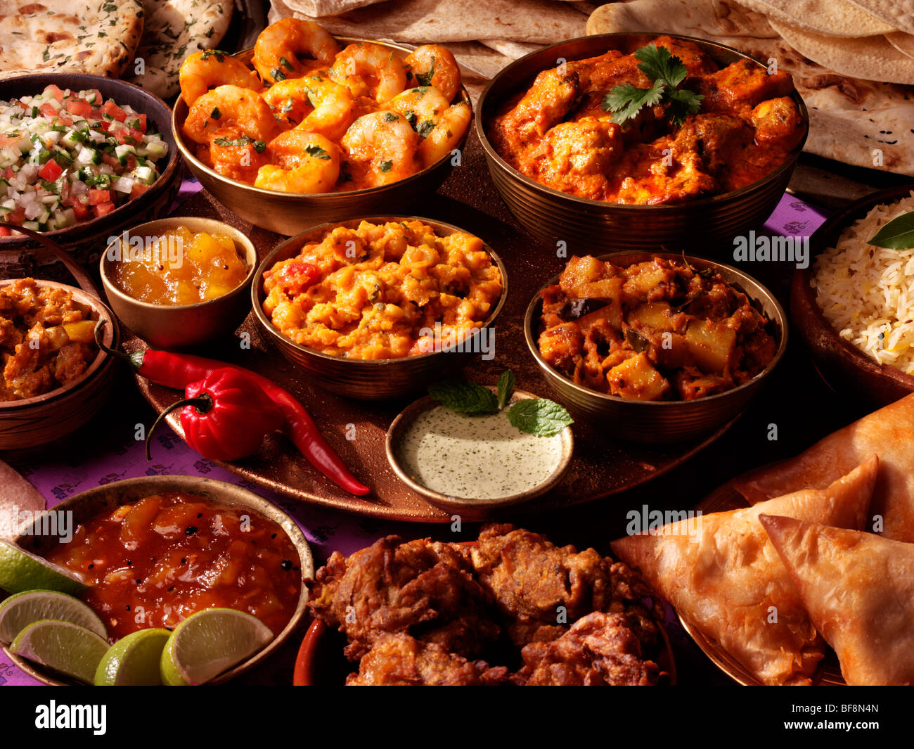 SELECTION OF COOKED INDIAN DISHES Stock Photo - Alamy