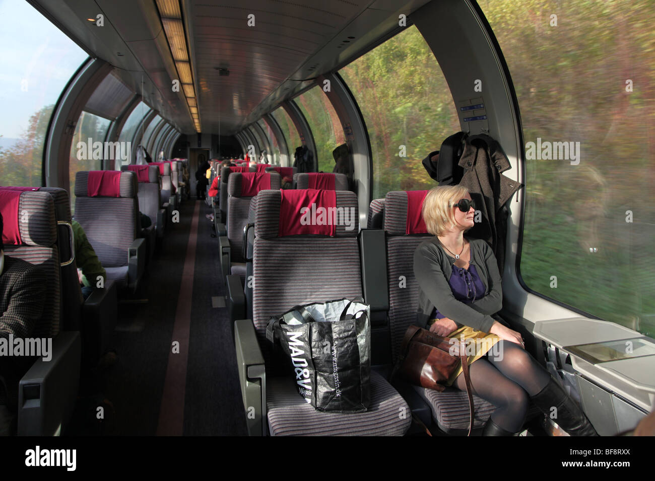 Interior of a panorama coach in a Swiss InterRegio train travelling ...