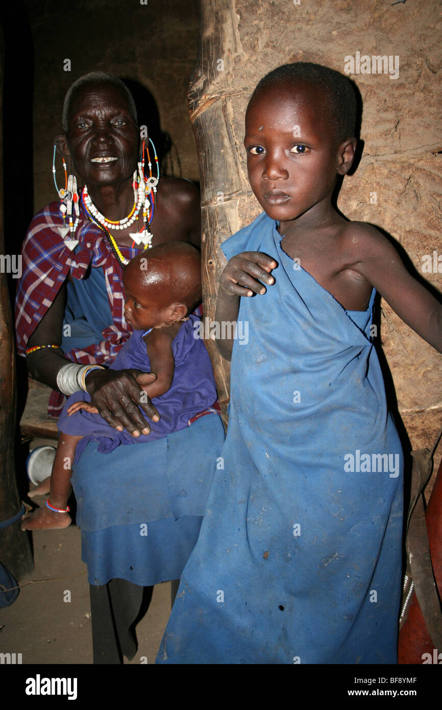 Elderly Masai Woman With Grandchildren In Her Home In Engaruka Village ...