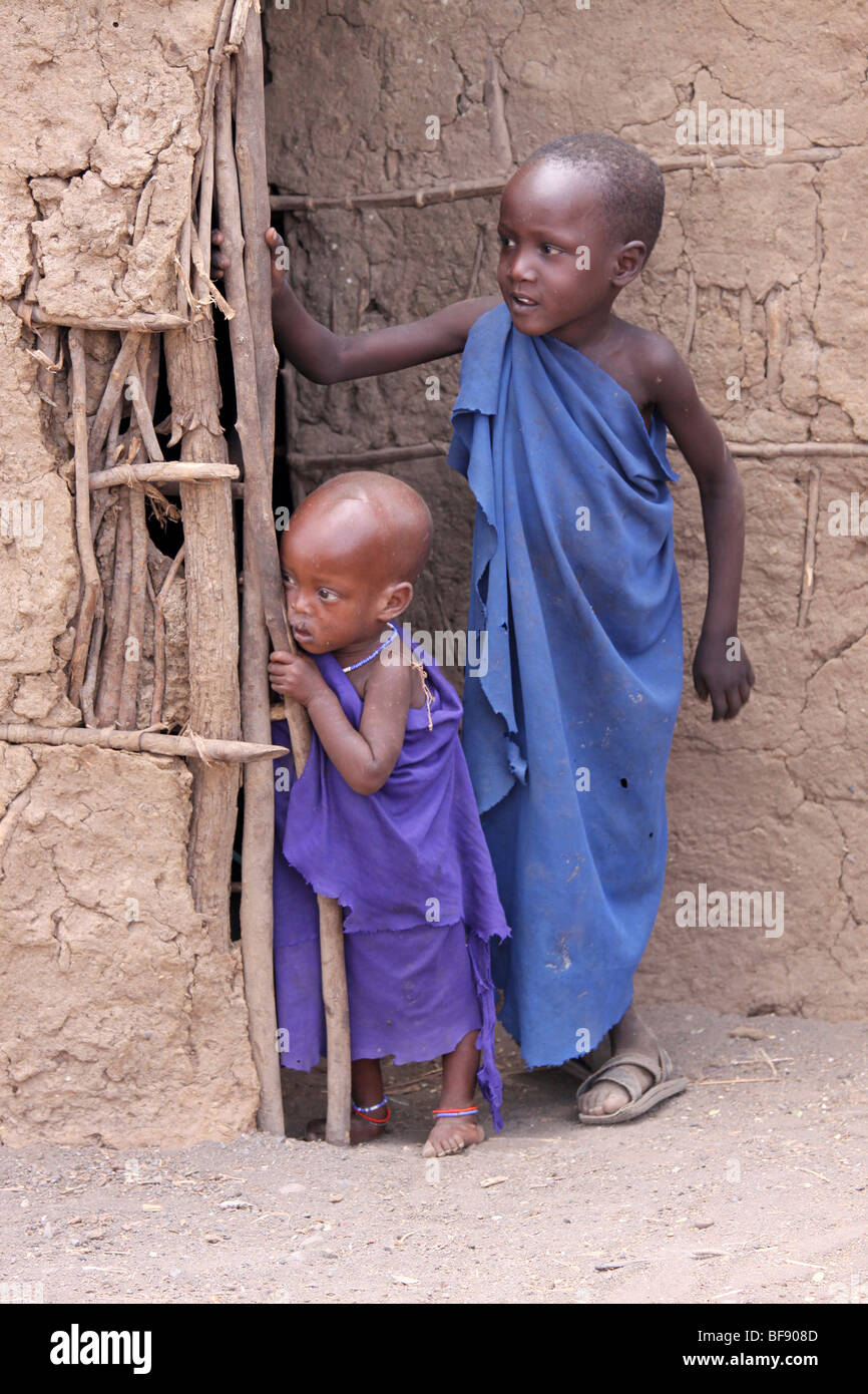 Young Masai Girls Outside Their Home In Engaruka Village, Rift Valley ...