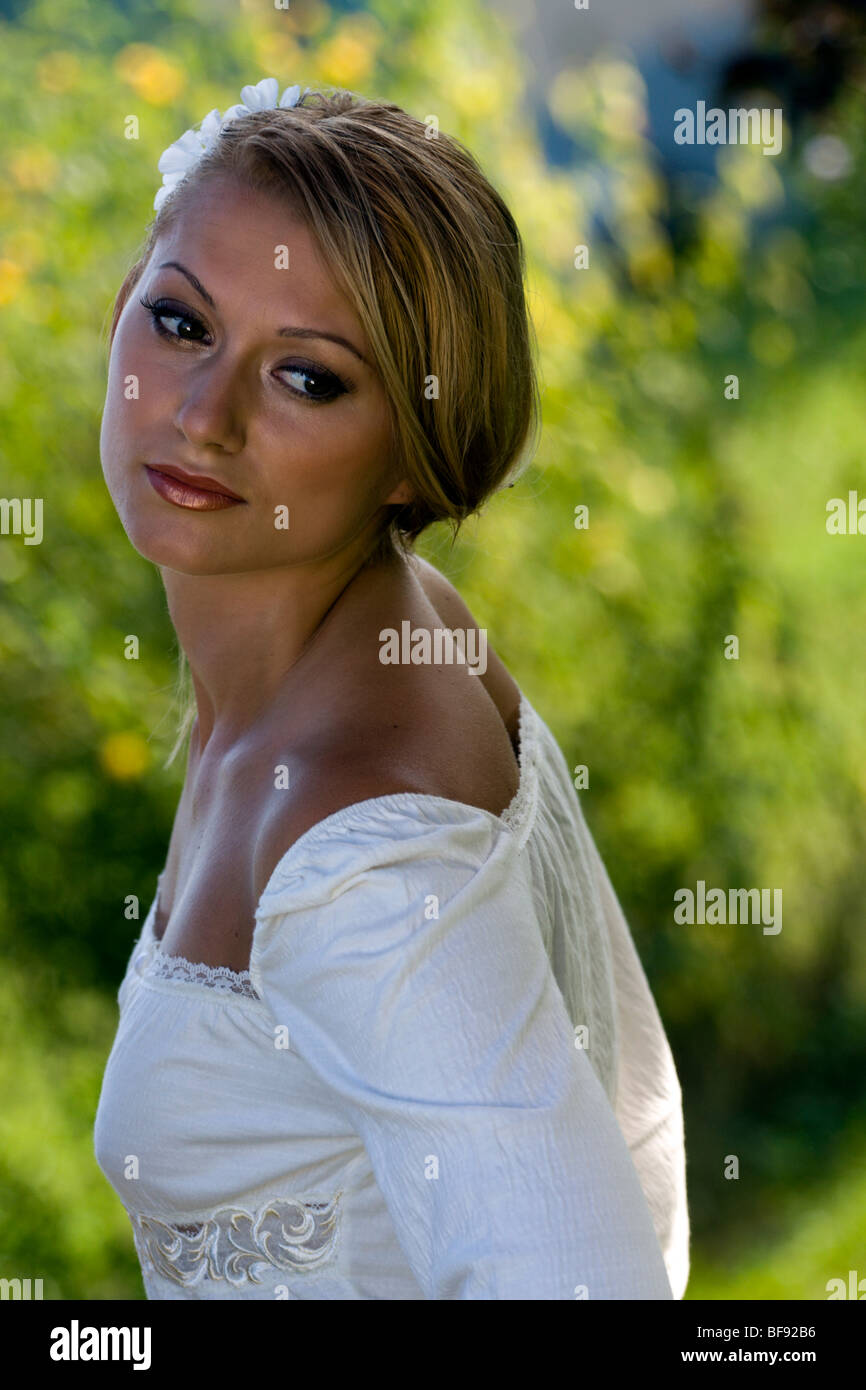 Portrait of the beautiful young bride looking over her shoulder Stock ...
