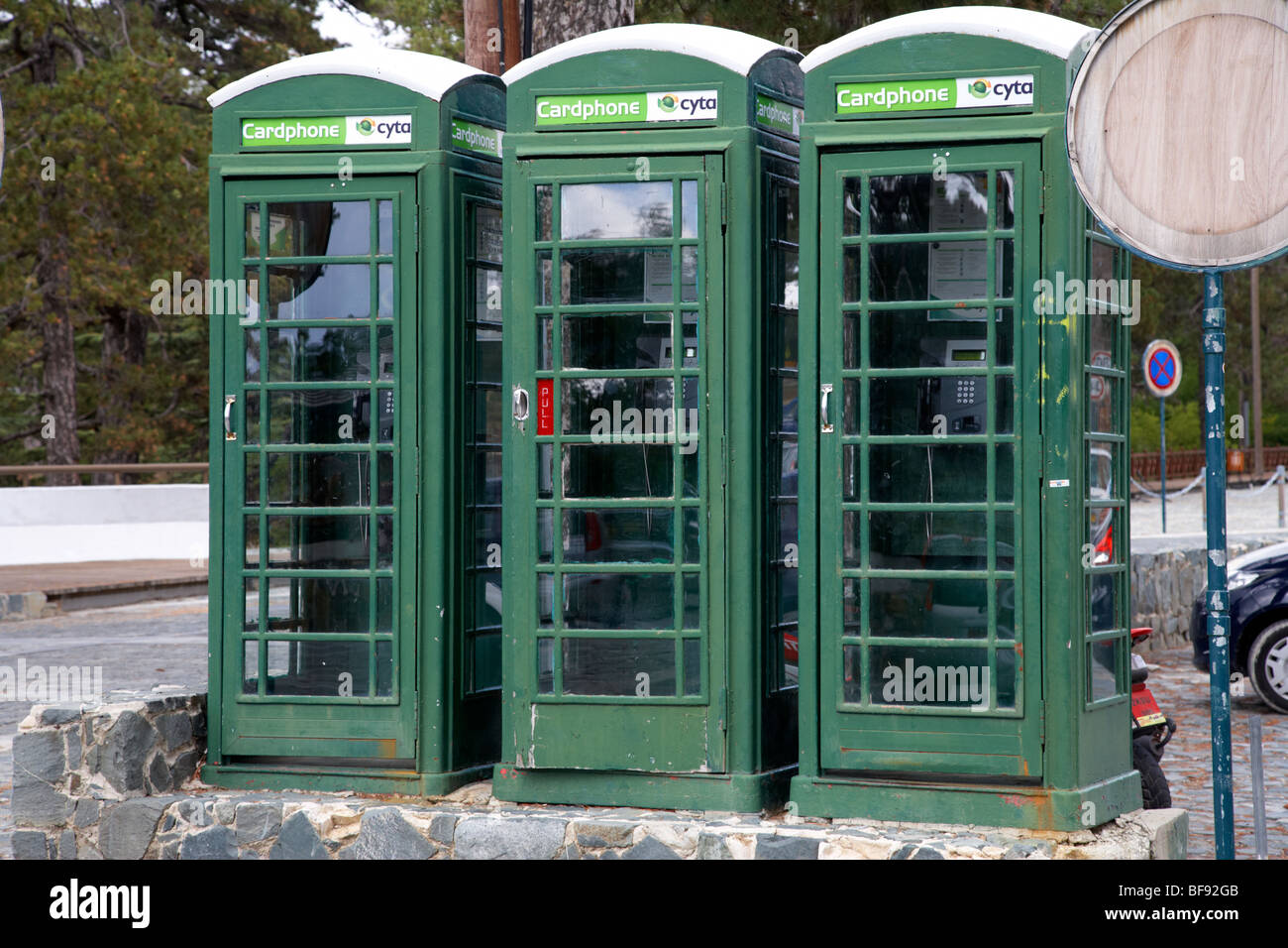 three old british telephone boxes painted green now owned by cyta ...