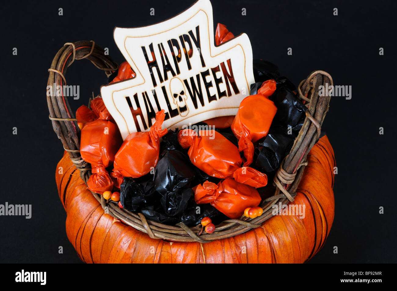 Halloween Basket with Candy Stock Photo - Alamy