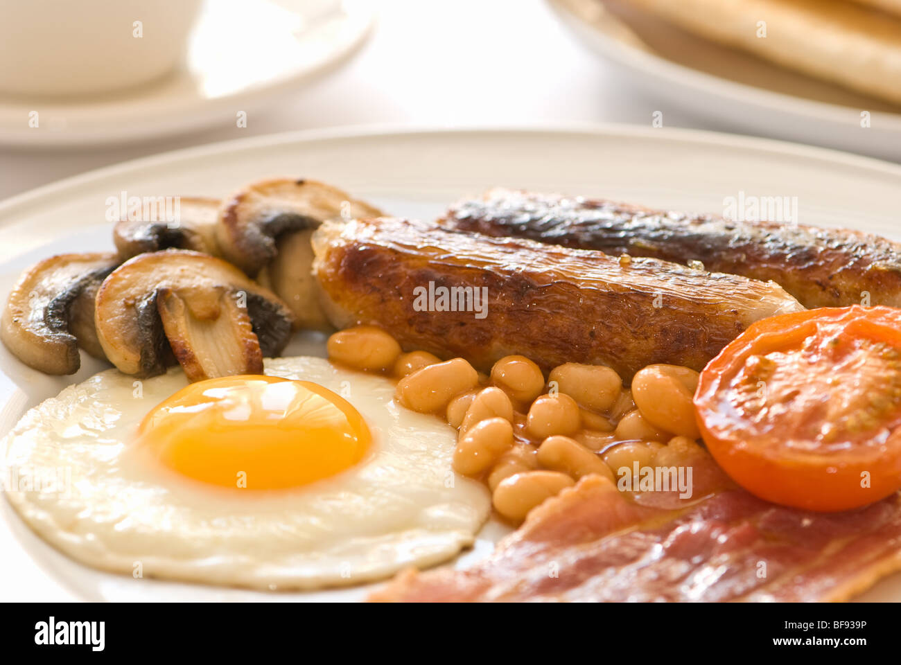 Traditional fried breakfast in place setting Stock Photo - Alamy