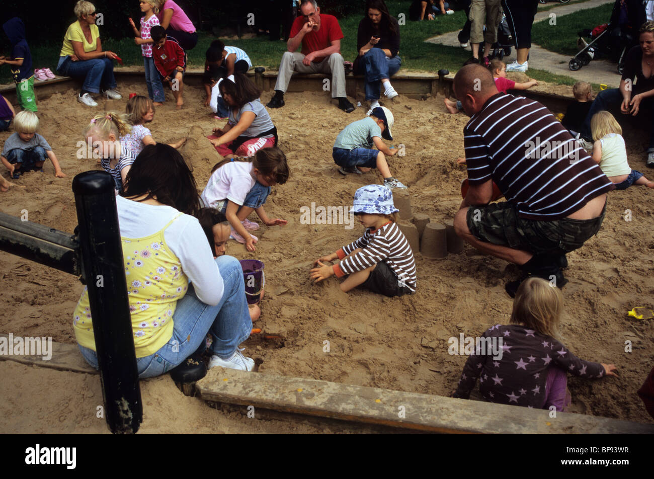 Children playing in sand pit hi-res stock photography and images - Alamy