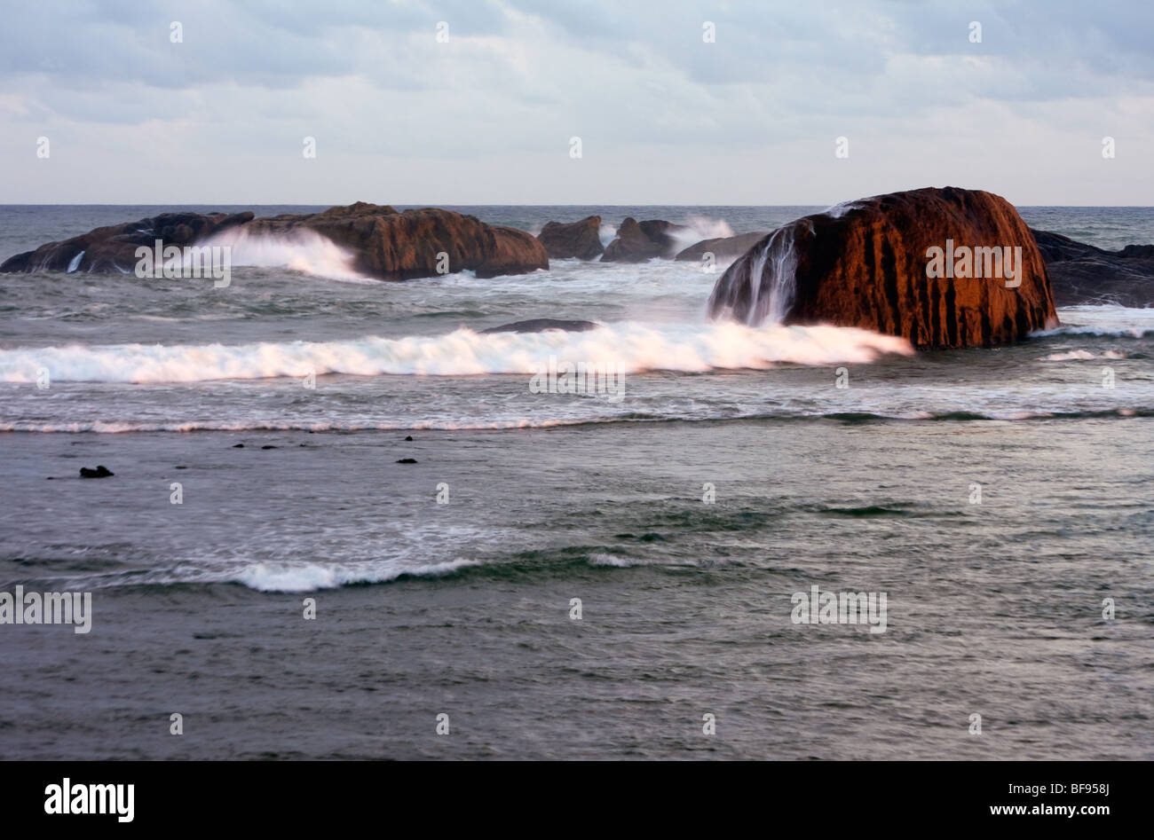 Rocks in the sea Stock Photo - Alamy