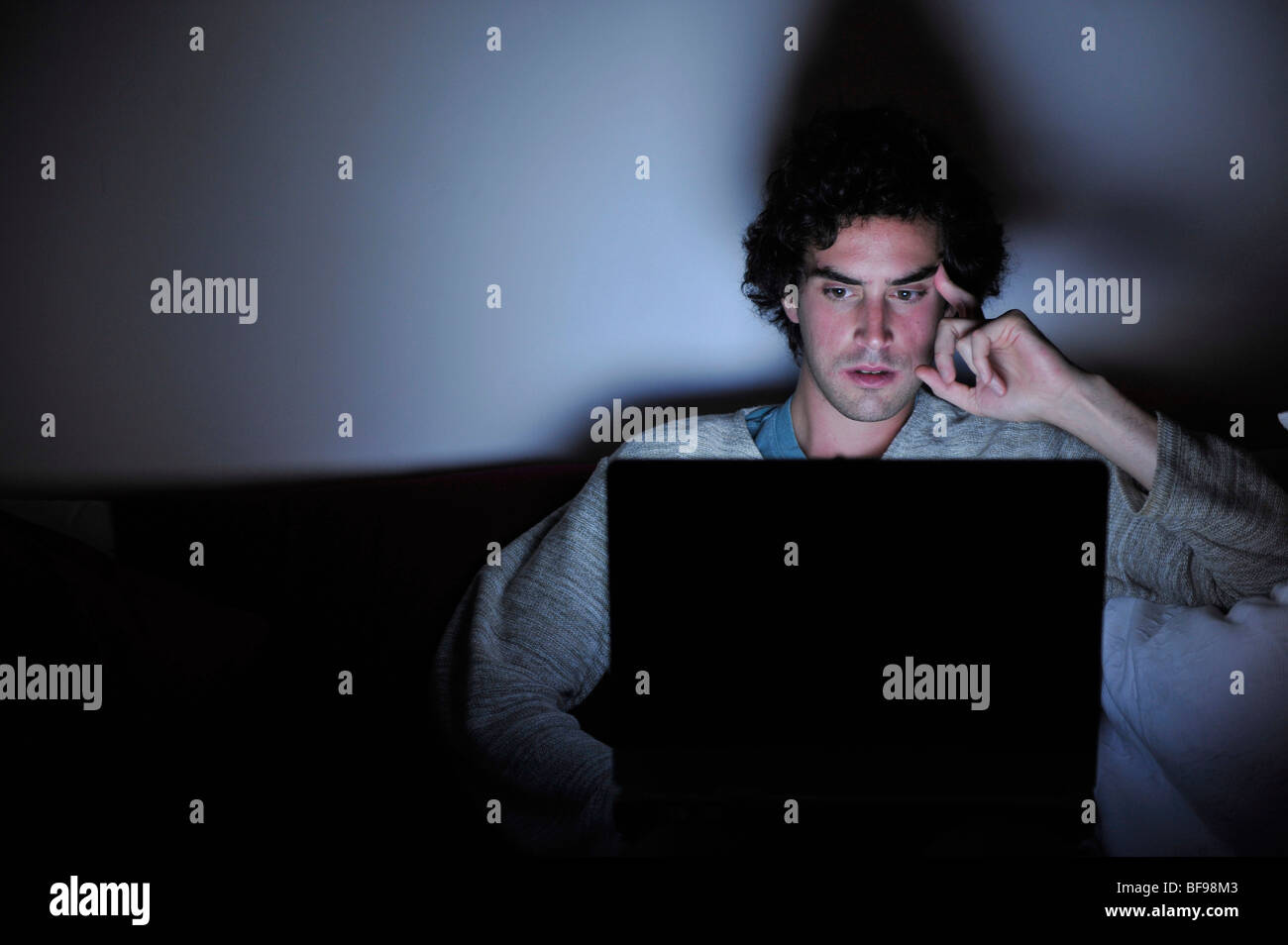 a young student using wifi laptop in the home Stock Photo - Alamy