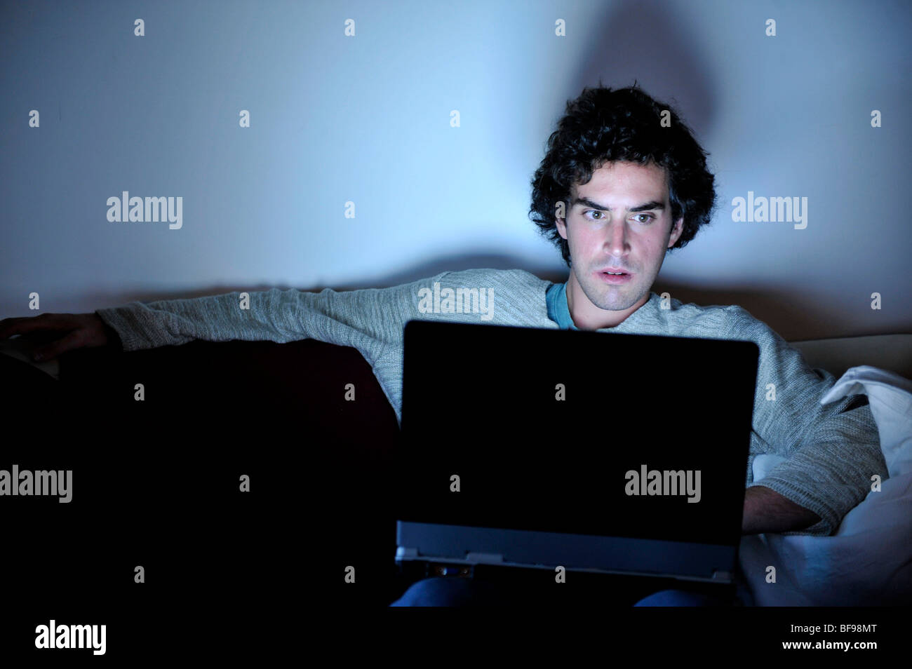 a young student using wifi laptop in the home Stock Photo - Alamy
