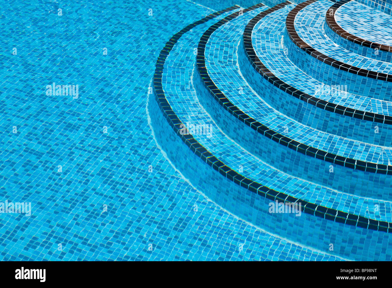 Swimming pool steps Stock Photo - Alamy