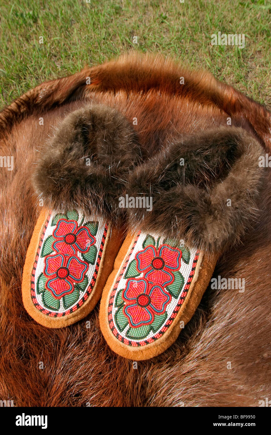 Moosehide moccasins lined with beaver fur and decorated with beaded ...