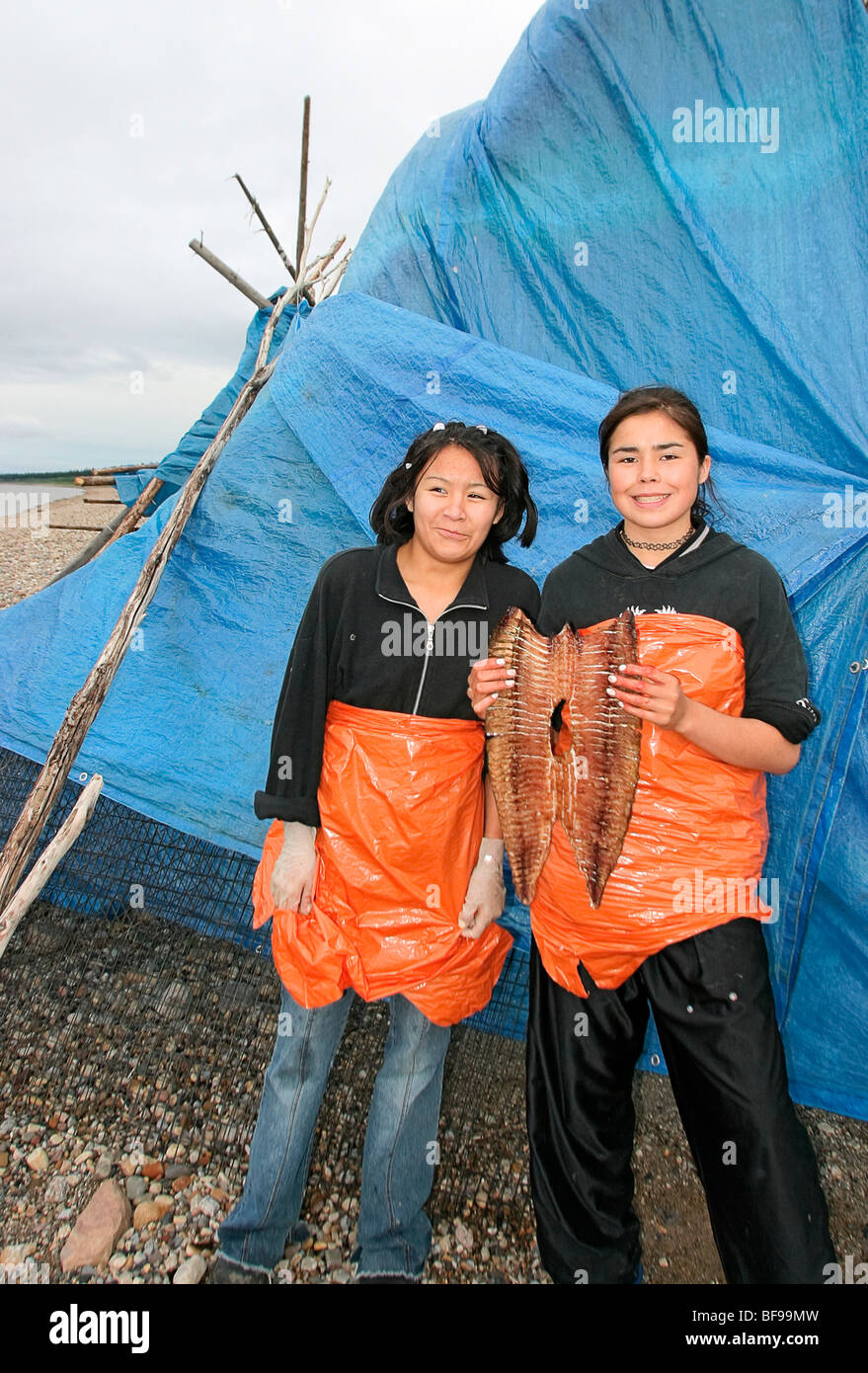Girls with dried fish at a fish camp for teens of Fort Good Hope run by ...