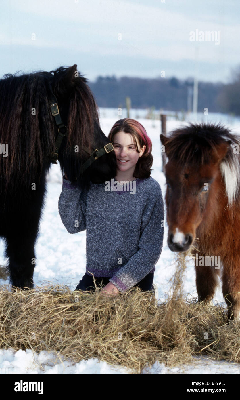 Girl hugging pony hi-res stock photography and images - Alamy