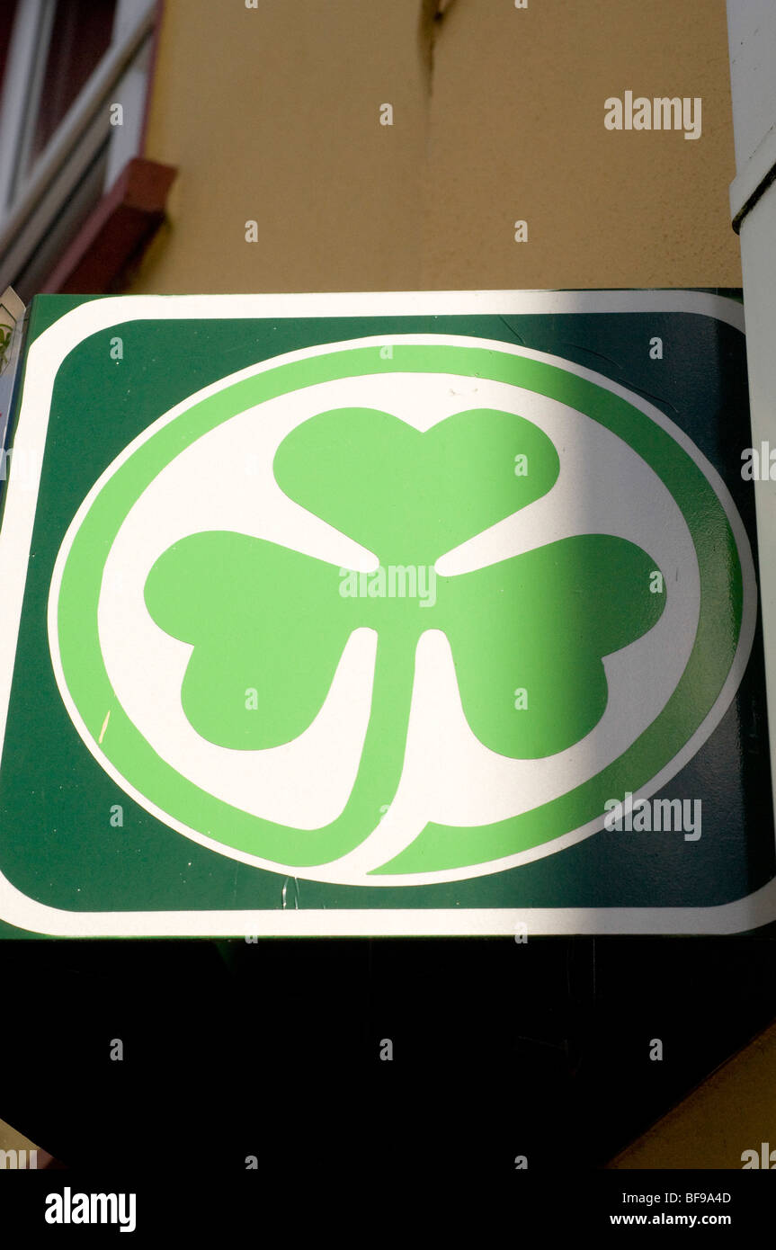 traditional irish colourful green shamrock tourism signs in the centre ...