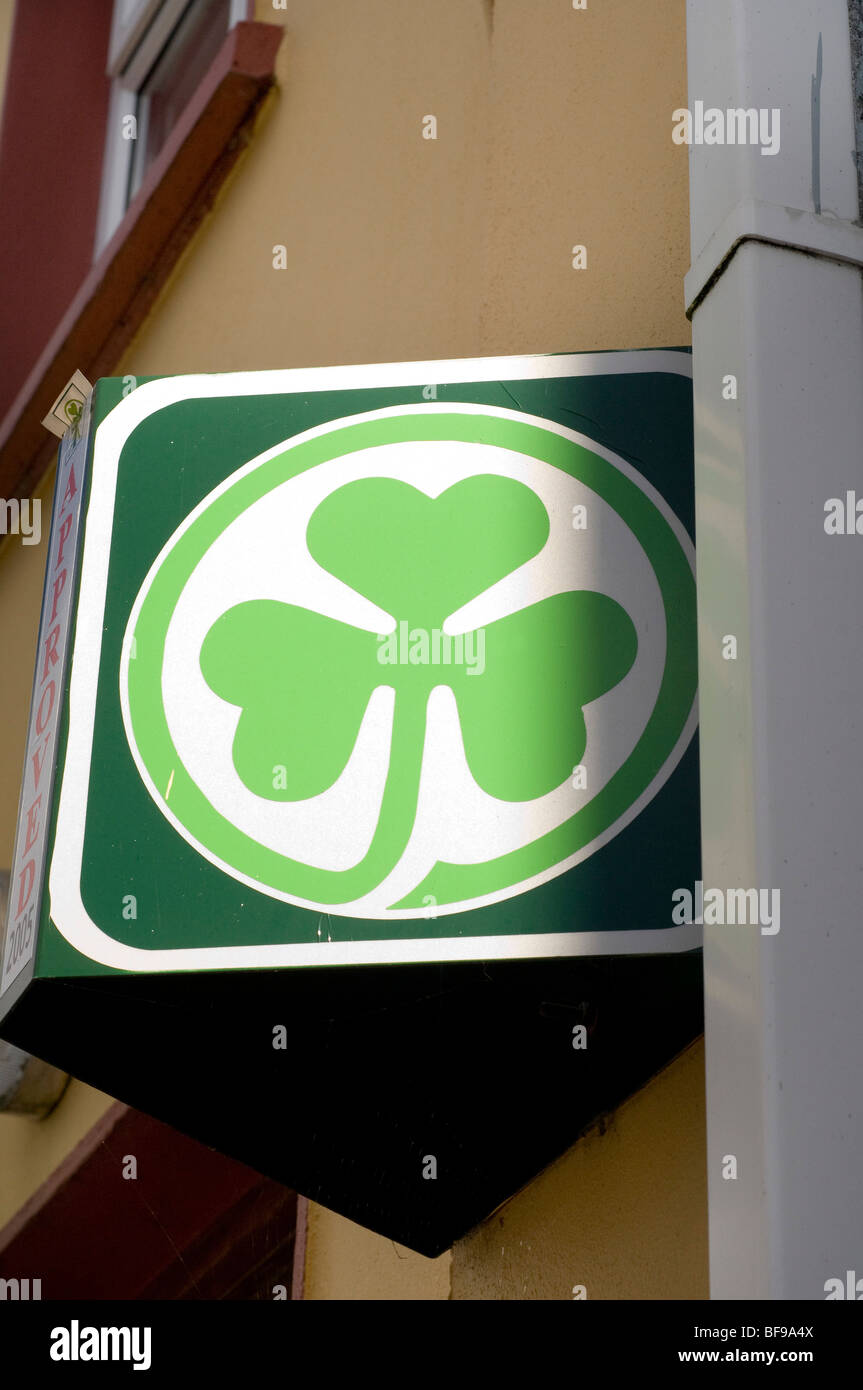 traditional irish colourful green shamrock tourism signs in the centre ...