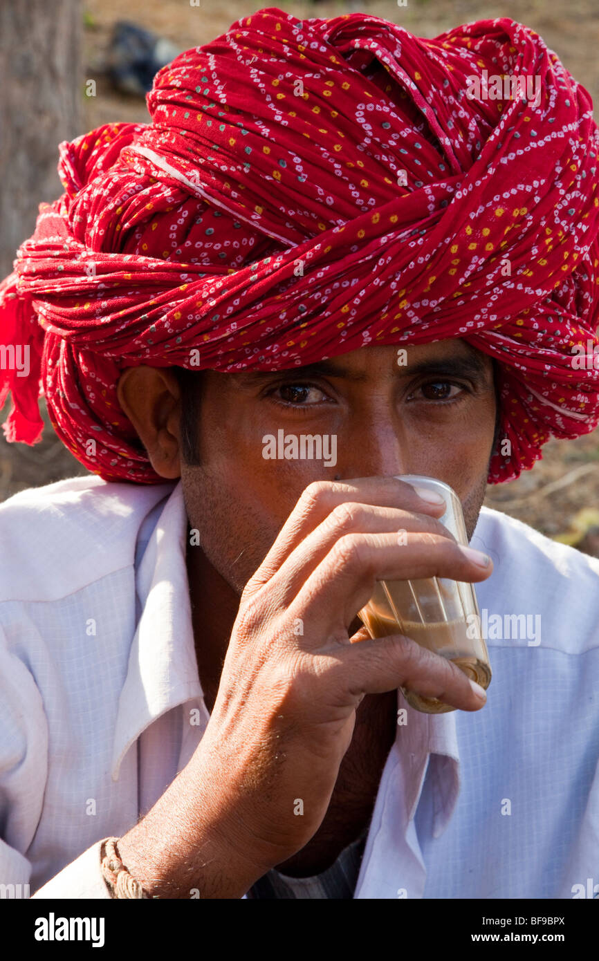 Rajput man drinking tea at the Pushkar Mela in Pushkar in Rajasthan ...