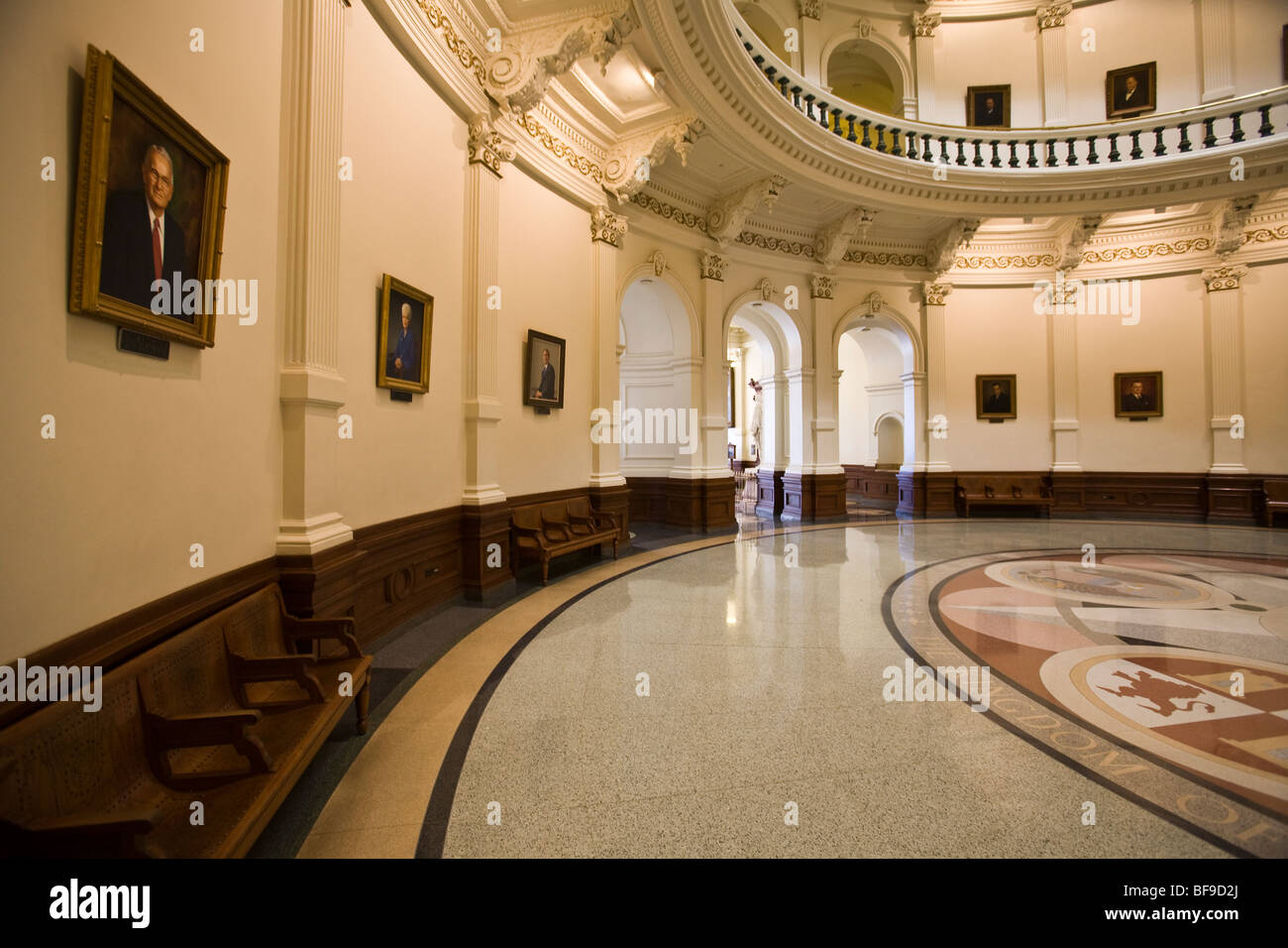 Portraits of Texas governors line the walls of the Capitol Rotunda in ...