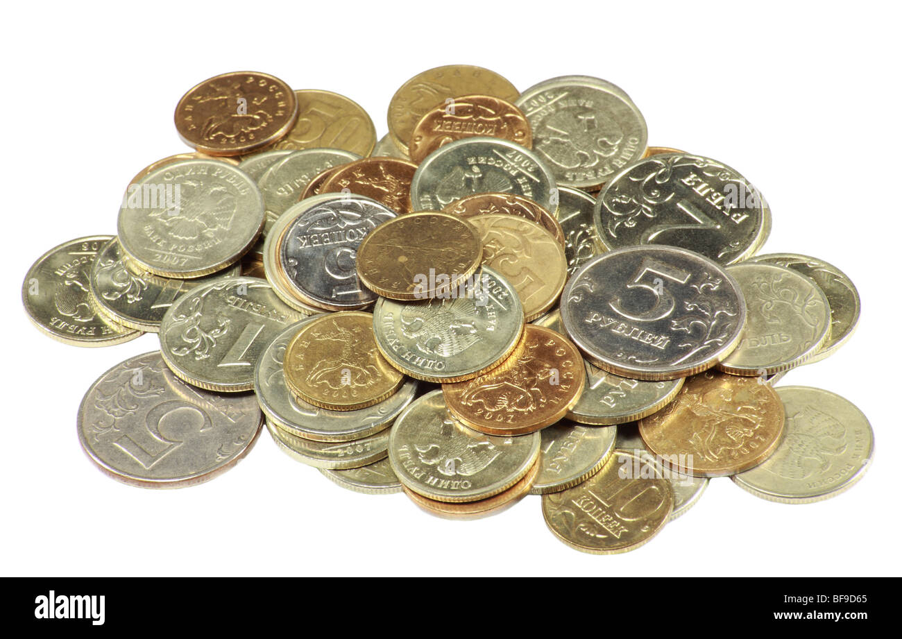 scattering of coins close up on white background Stock Photo - Alamy