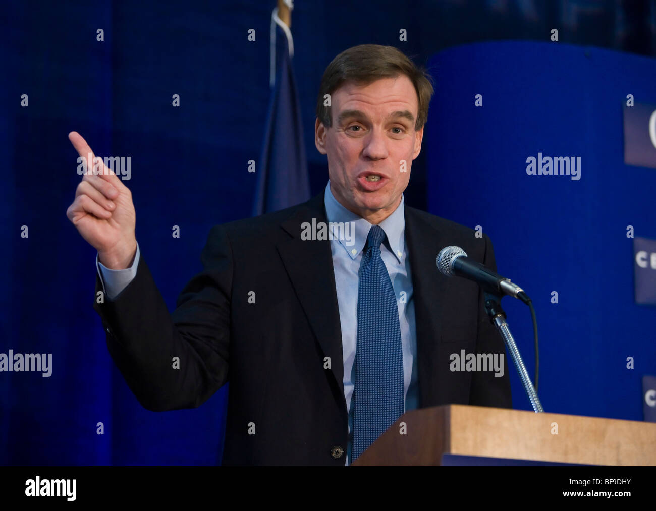 Senator Mark Warner (D-VA) at a podium giving a keynote address Stock ... Senator Mark Warner (D-VA) at a podium giving a keynote address Stock ...