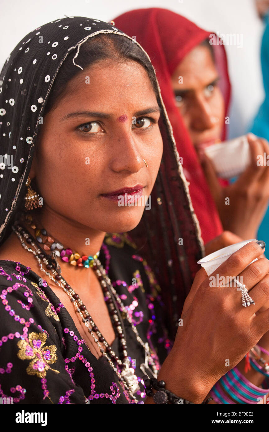 Rajput women drinking chai tea at the Pushkar Mela in Pushkar in ...