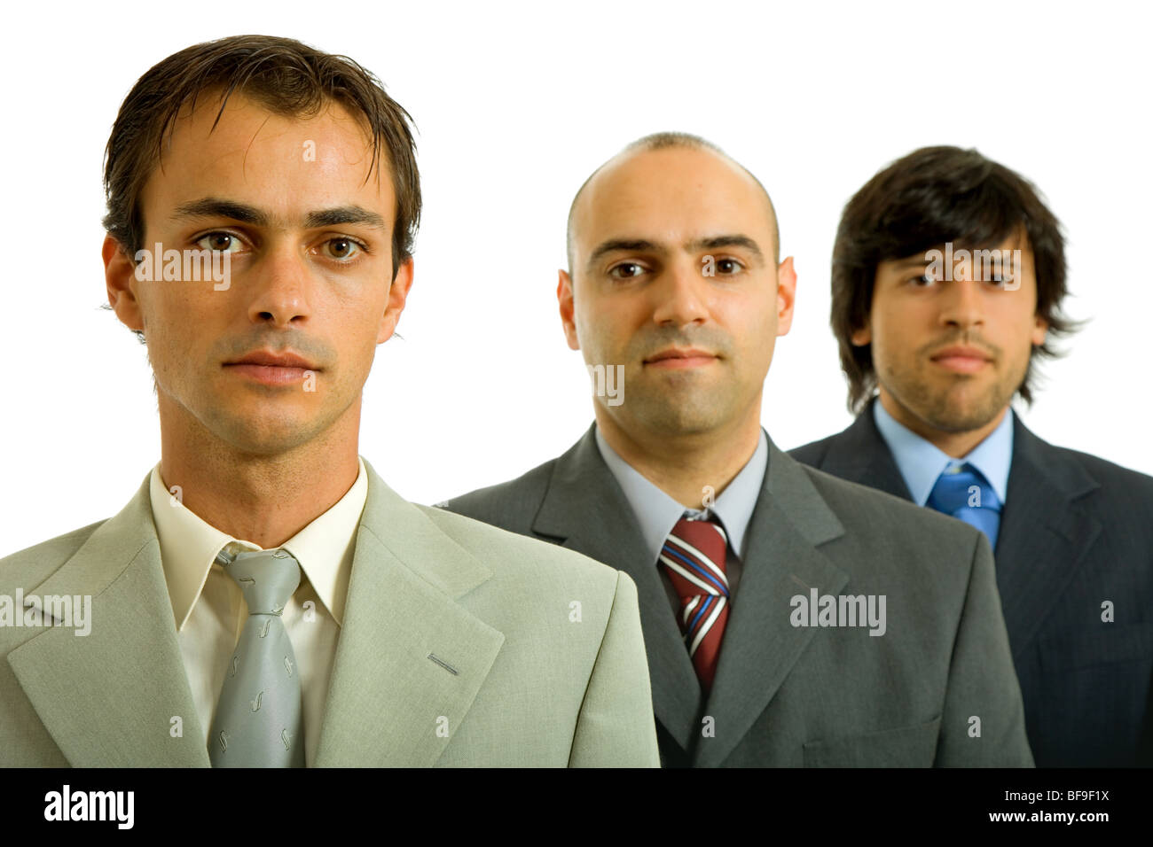 three business men isolated on white background Stock Photo - Alamy