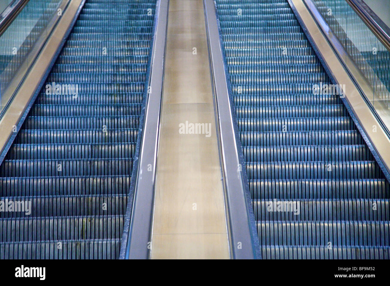 Up and down escalator steps Stock Photo - Alamy