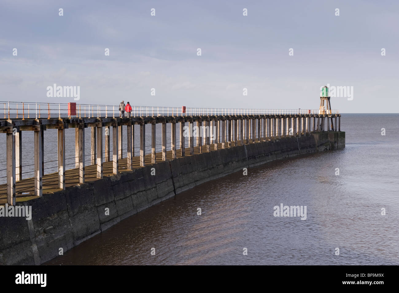 One of the piers at the entrance to Whitby harbour Stock Photo - Alamy
